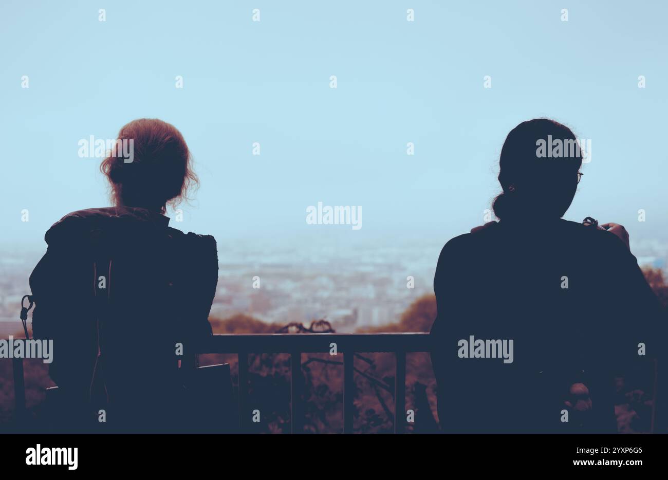 Vintage retro photo with two women standing at the viewpoint of Mount ...