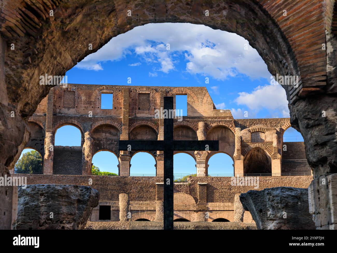 Interior view of the Colosseum in Rome, Italy: the cross in the center ...