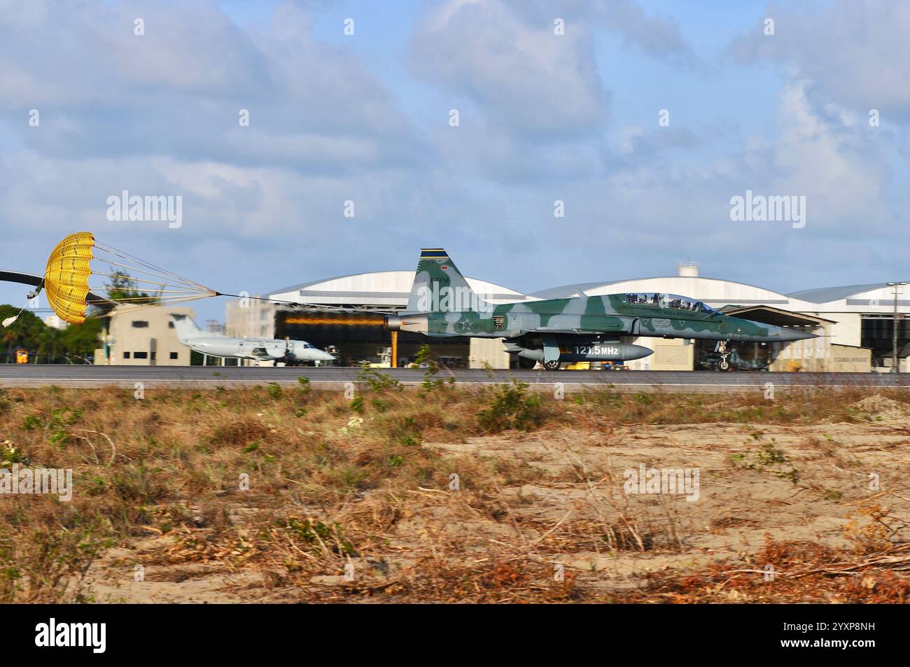 An F-5FM of the Brazilian Air Force with drag chute deployed for ...
