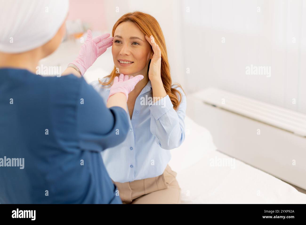 In a calming spa setting, a skincare professional guides a client through a cosmetic treatment ...