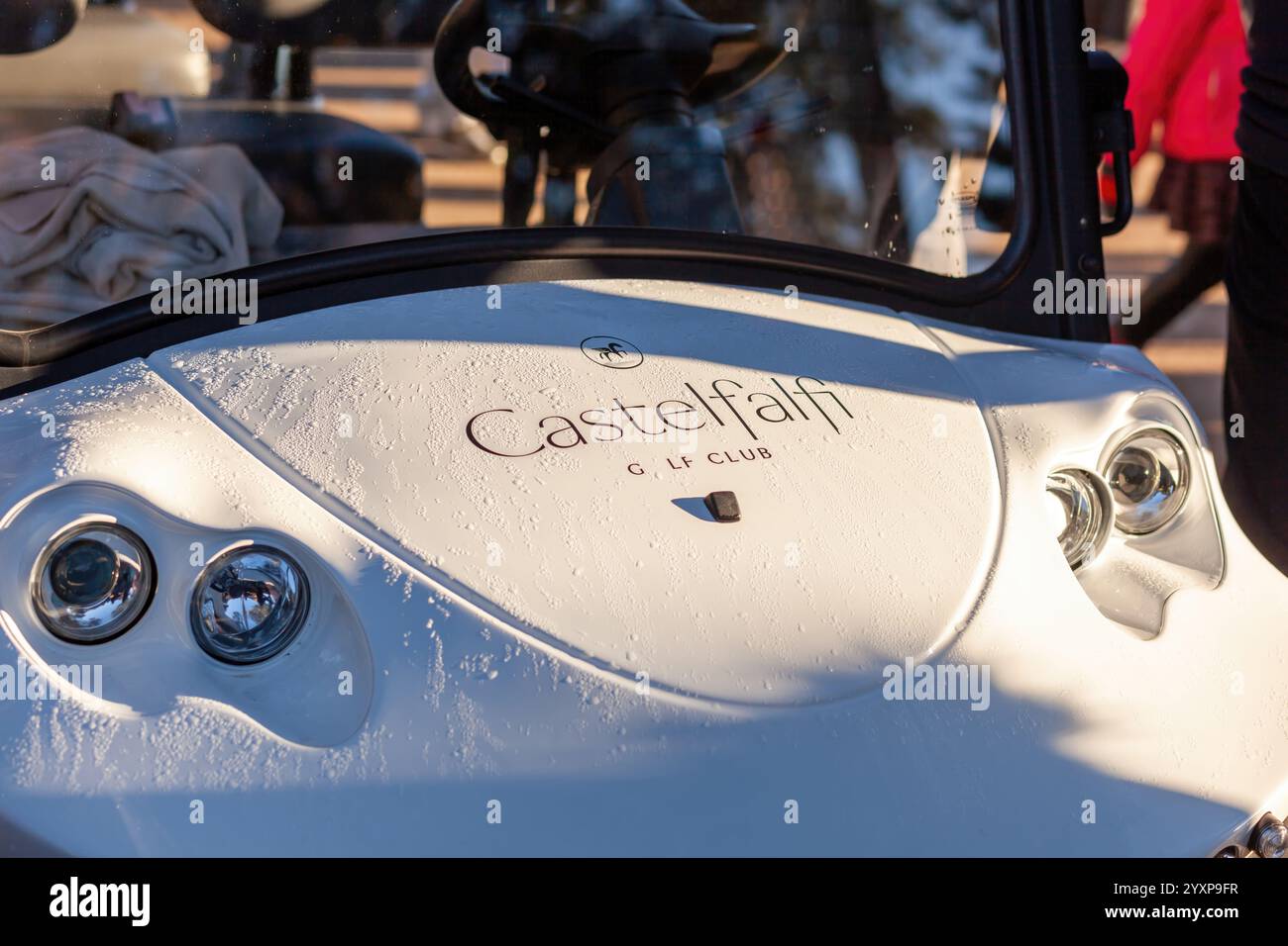 Castelfalfi, italy - December 15, 2024: white golf cart with the ...
