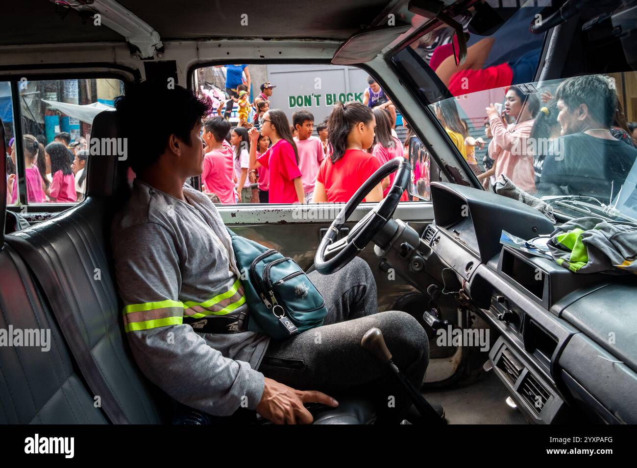 A Catholic religious parade passes by during an annual parade in the ...