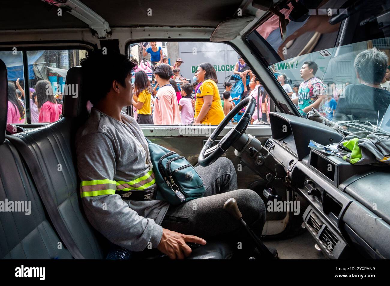 A Catholic religious parade passes by during an annual parade in the ...