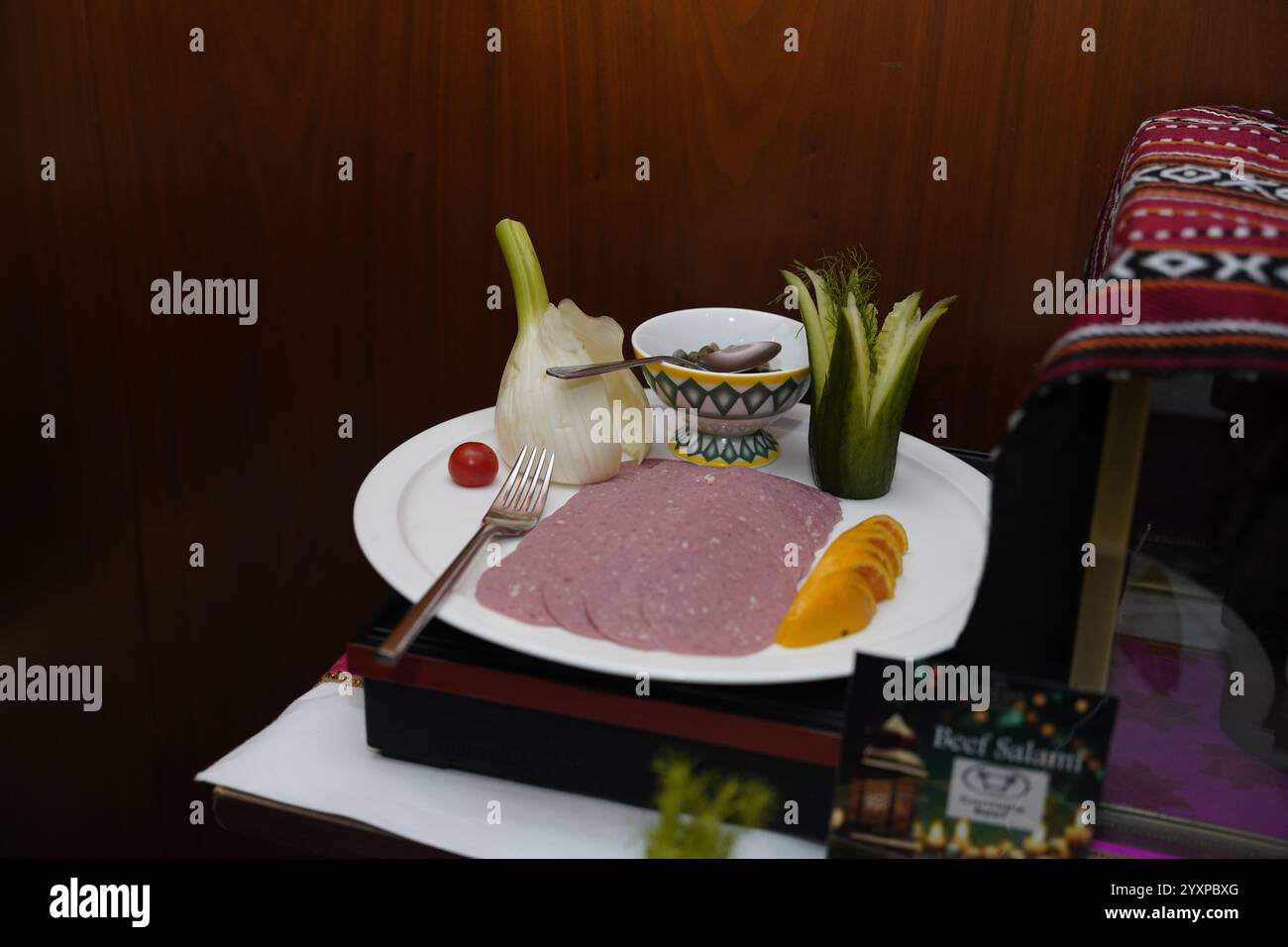 An elegantly arranged plate featuring a variety of delicacies ...