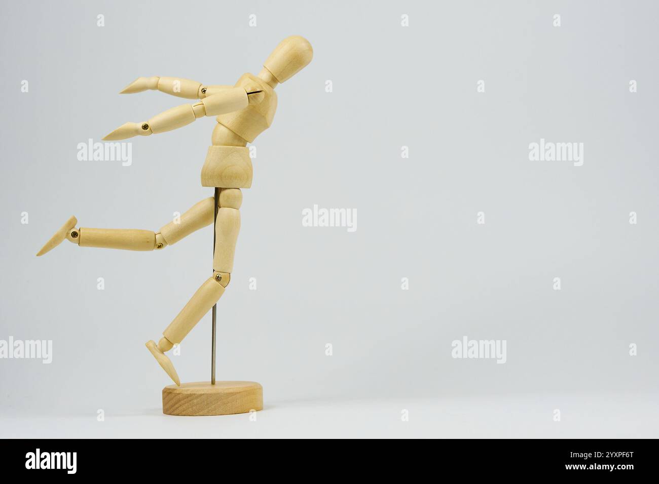 Articulated wooden figure representing the position of some type of ...