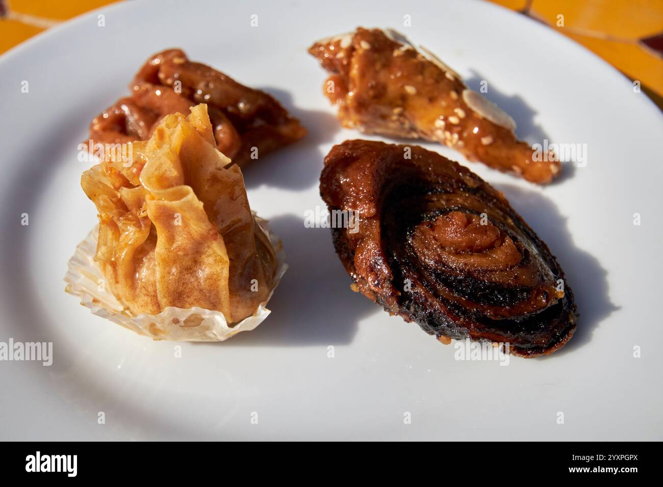 moroccan sweet pastries from a stall in the souk marrakesh, morocco ...