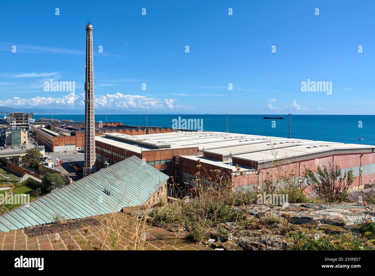 Savona, Italy - December 17, 2024: Industrial complex by the sea, with ...