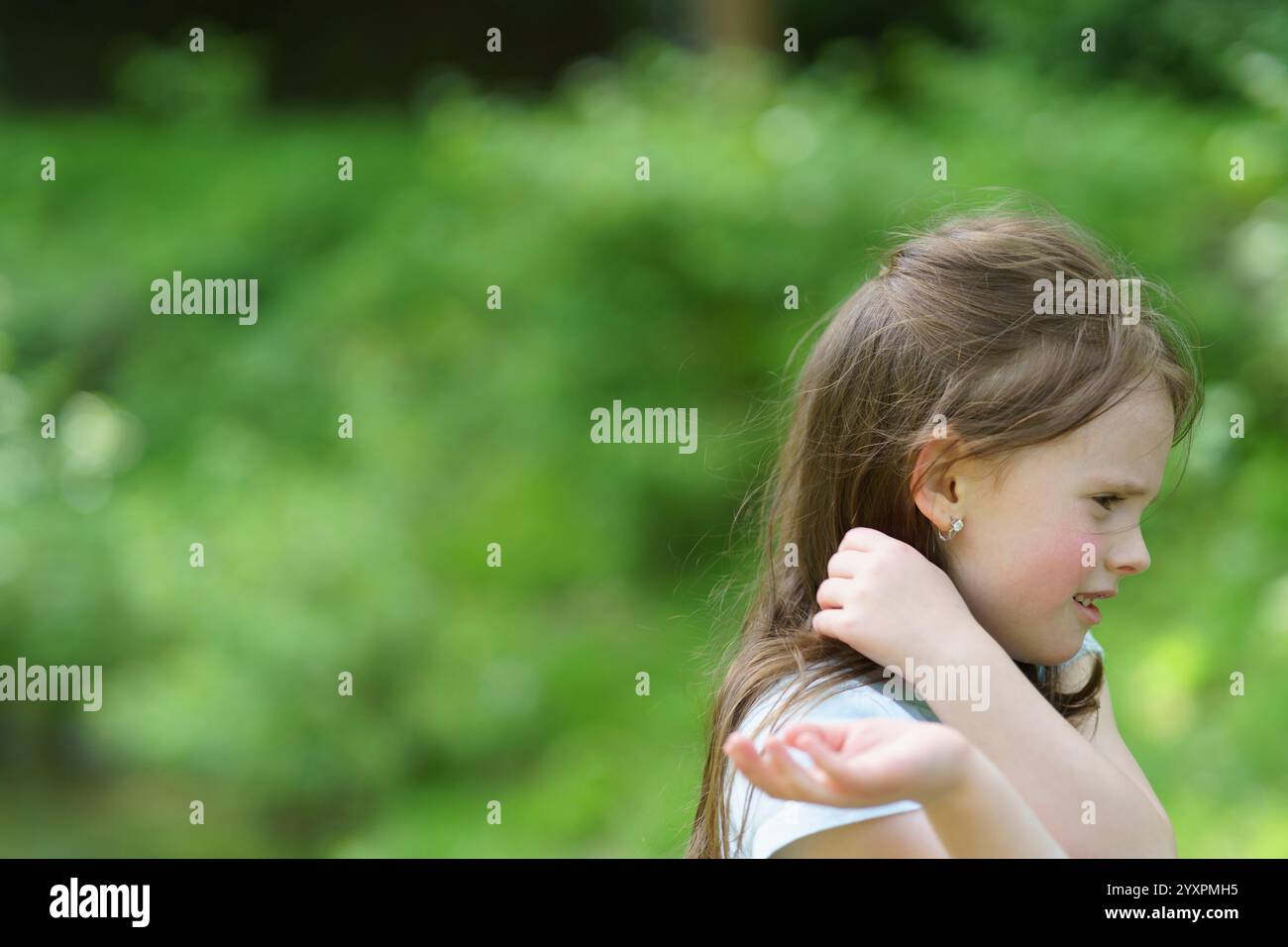 Little cute sad girl walking in summer park. Concept of sad child ...