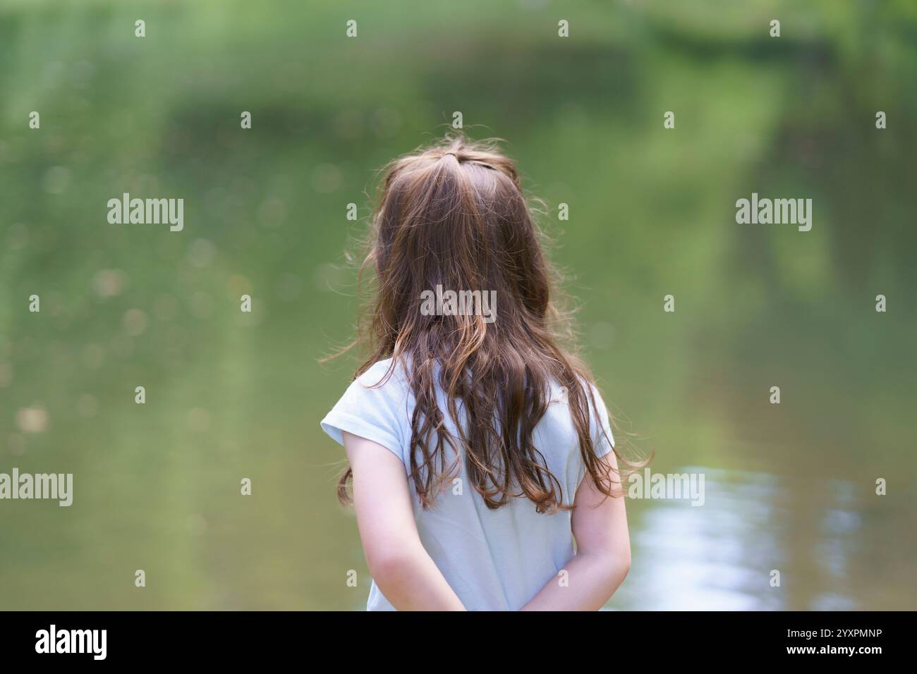 Little cute sad girl walking in summer park. Concept of sad child ...