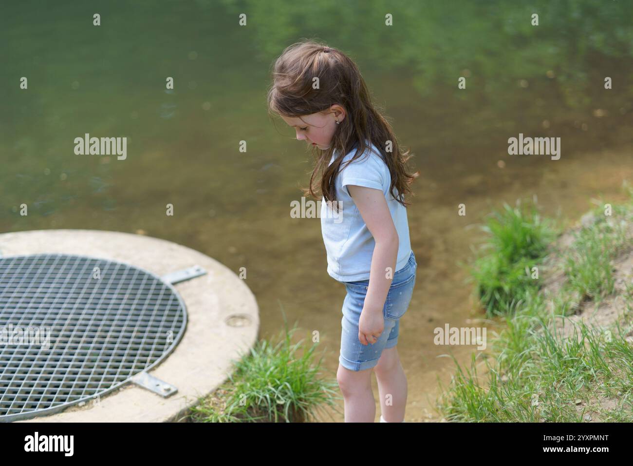 Little cute sad girl walking in summer park. Concept of sad child ...