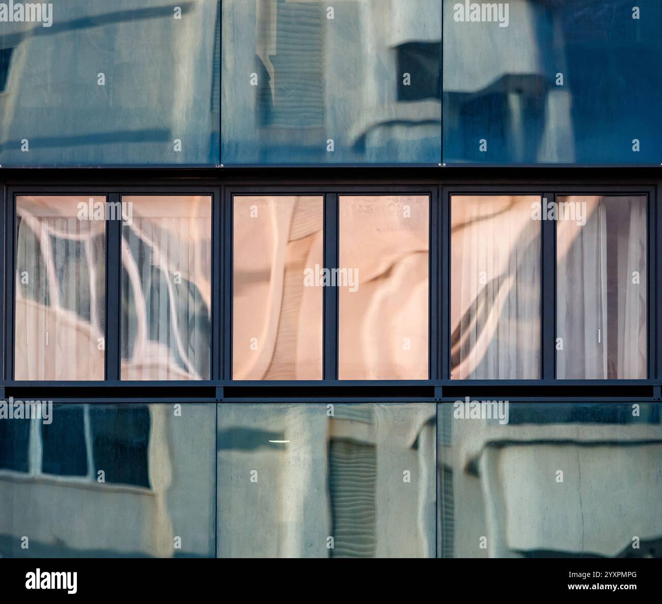 reflections in a window in Benidorm Stock Photo - Alamy