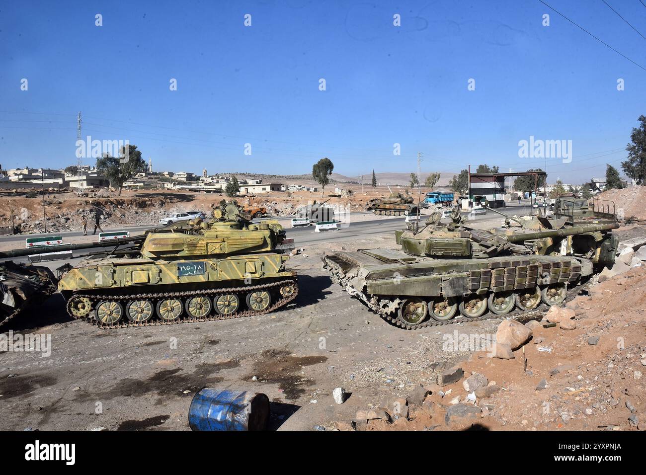 Daraa, Syria. 17th Dec, 2024. Tanks and abandoned military vehicles ...