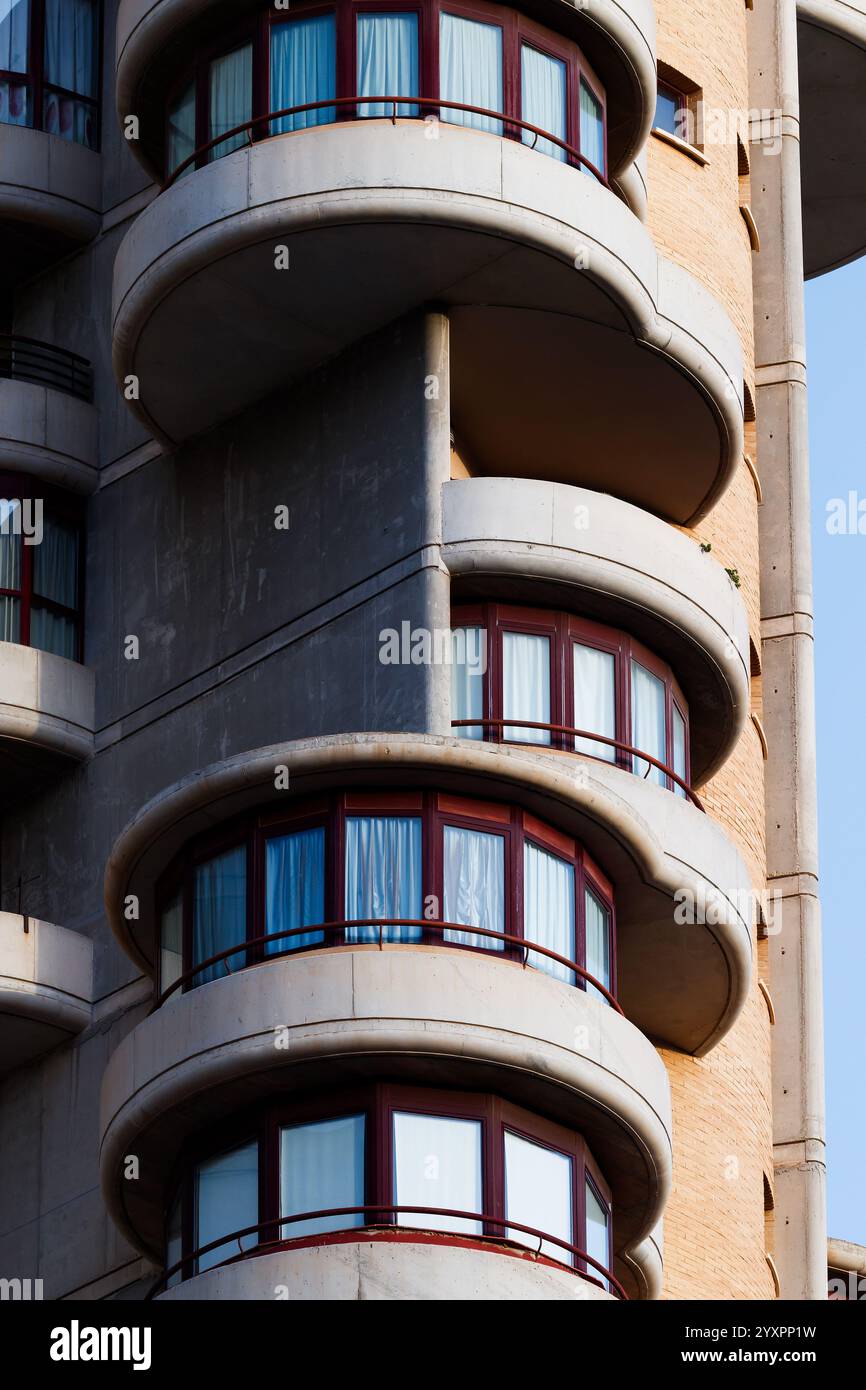Curved terraces in a skyscraper in Benidorm Stock Photo - Alamy