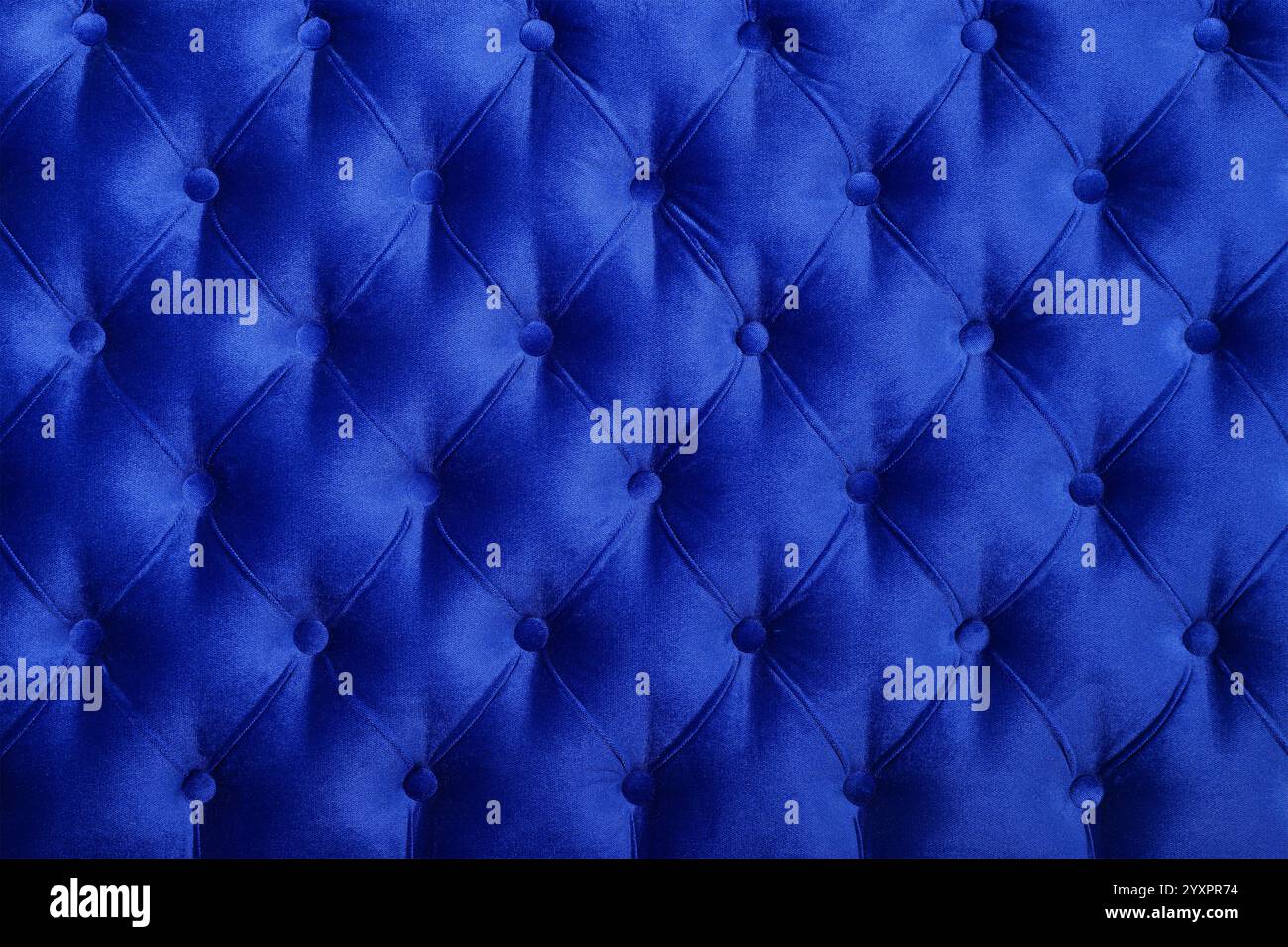 Indigo blue velvet capitone textile background, retro Chesterfield ...