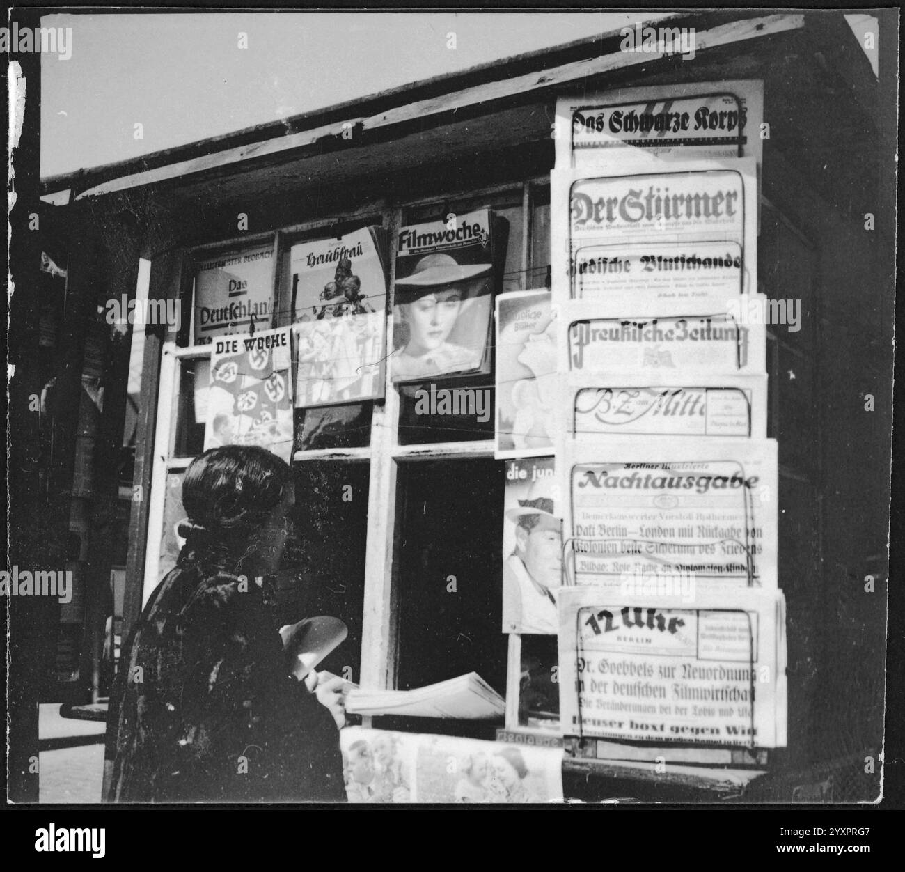 Danzig (Gdansk) 1937: newspaper stand; Woman in front of newspaper ...