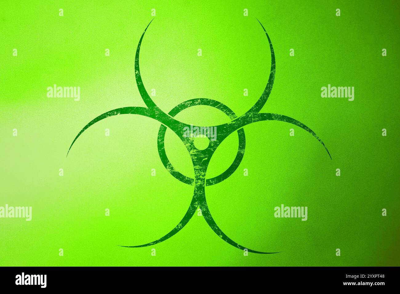 Green biohazard warning sign painted over grunge acid green background ...