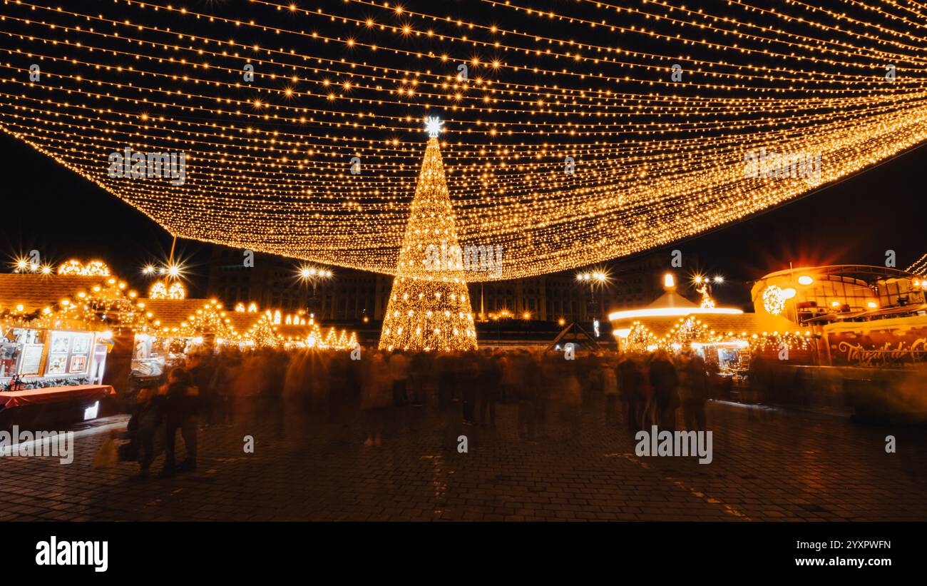 People in front of Christmas tree at Bucharest Christmas Market Stock ...
