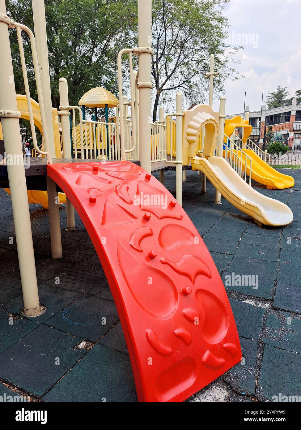 Slide playground rain hi-res stock photography and images - Alamy