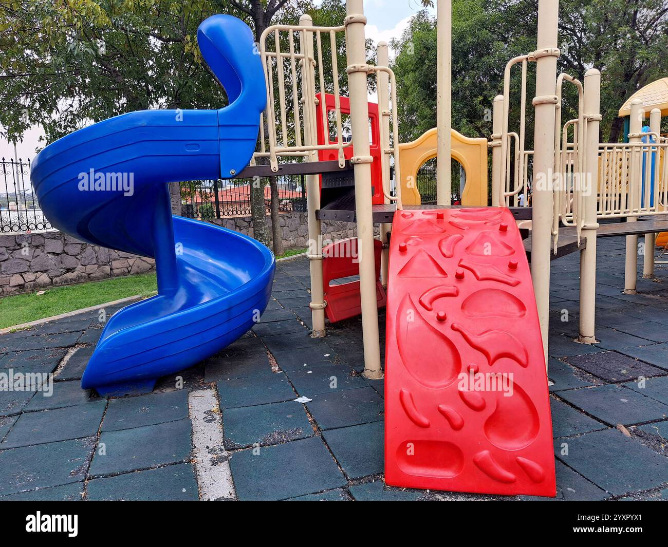 Slide playground rain hi-res stock photography and images - Alamy