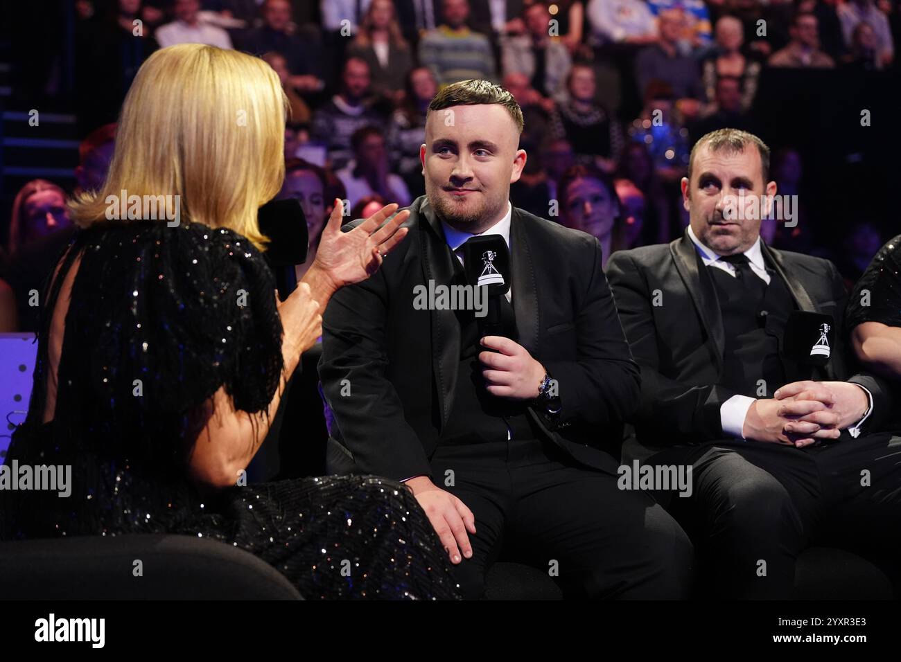 Garry Logan speaks to nominee Luke Littler, alongside his father ...