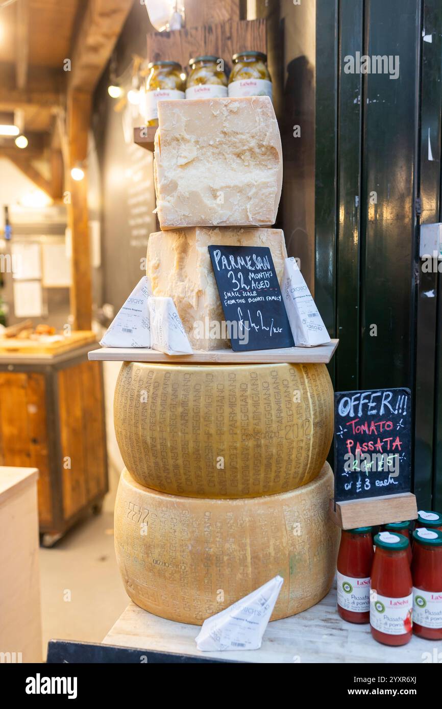 London, UK – December 3, 2024, Italian Parmesan cheese wheels for sale ...