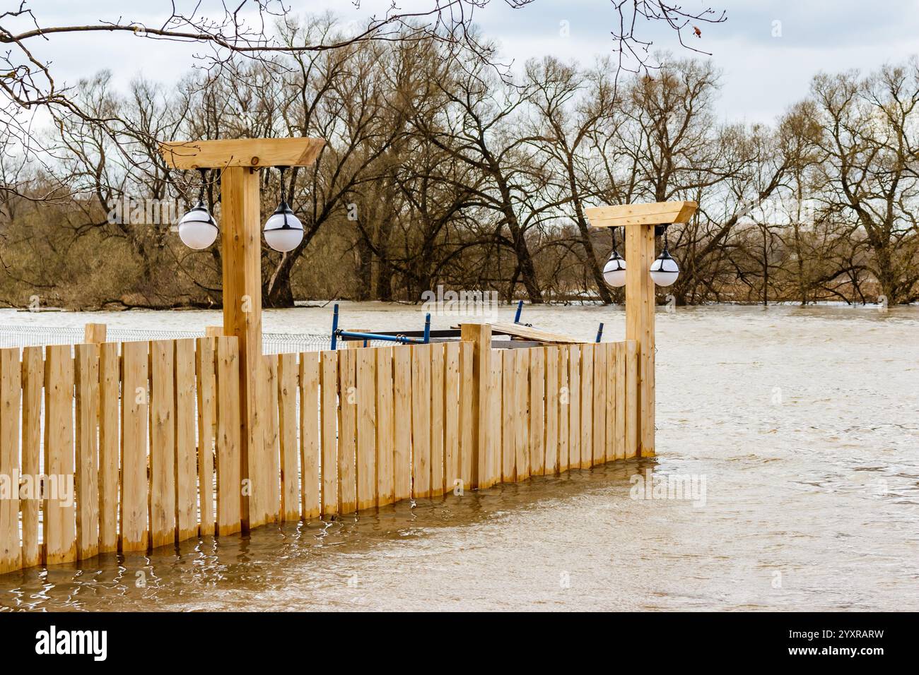 Coastal area near a river flooded during rising water levels in spring ...