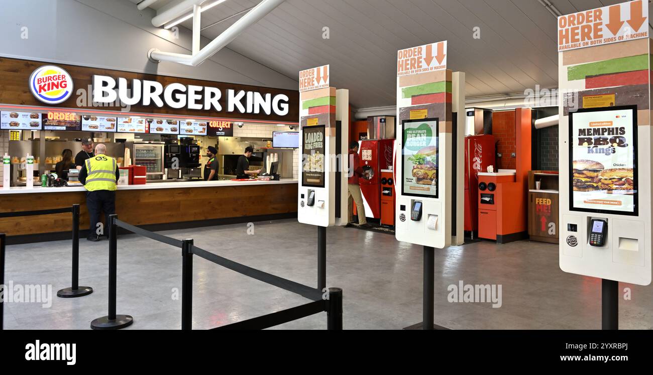 Inside a Burger King restaurant with electronic fast food ordering ...