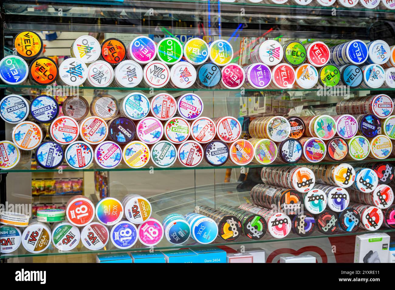 Velo and Iceberg nicotine pouches for sale in a shop window display ...