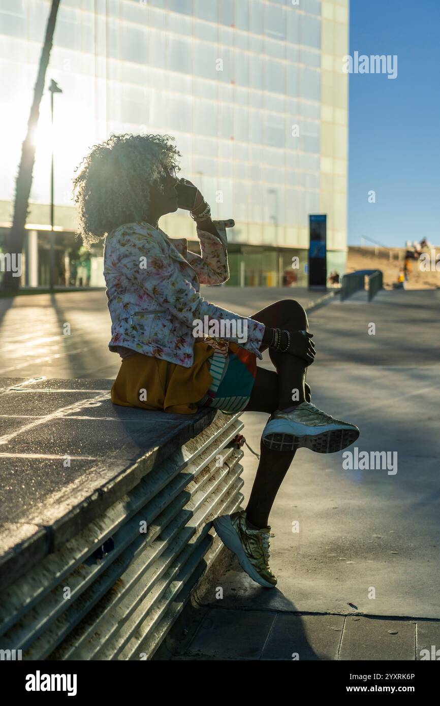 Stylish, afro-american lady with hoary afro hair and sunglasses ...