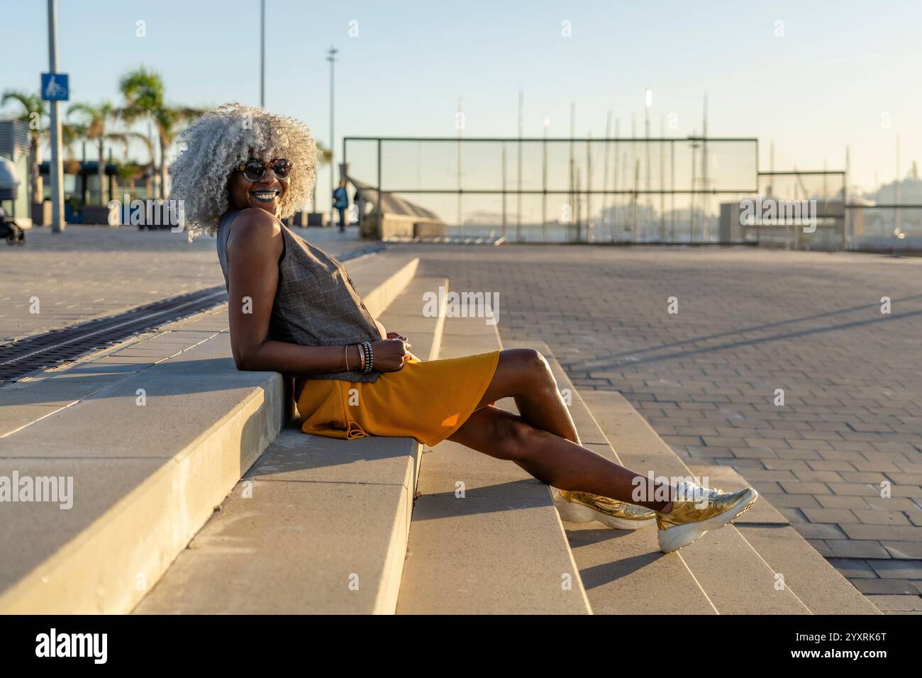 Stylish, afro-american lady with hoary afro hair and sunglasses ...
