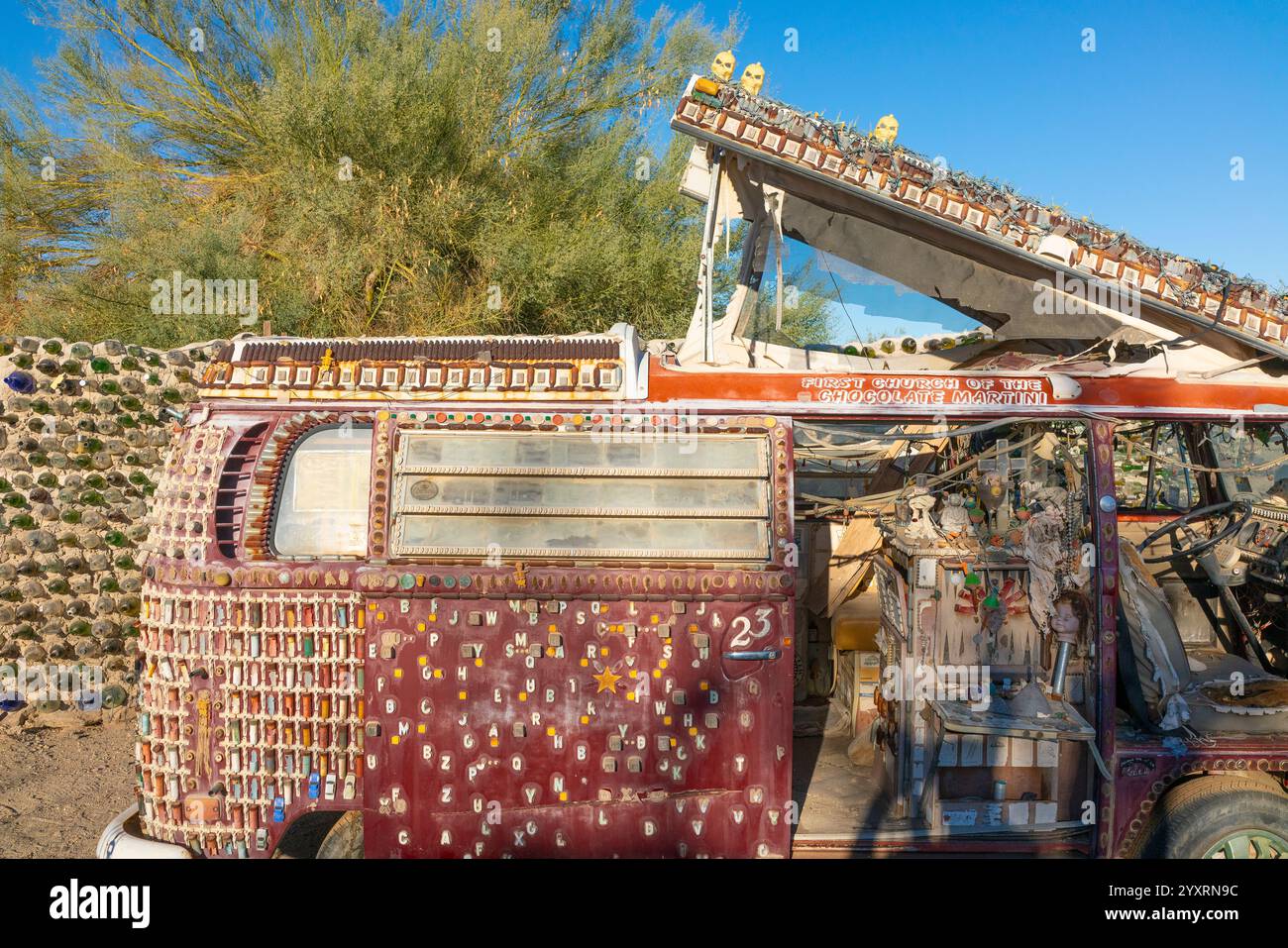 Highly decorated VW bus in East Jesus, California. East Jesus is an ...