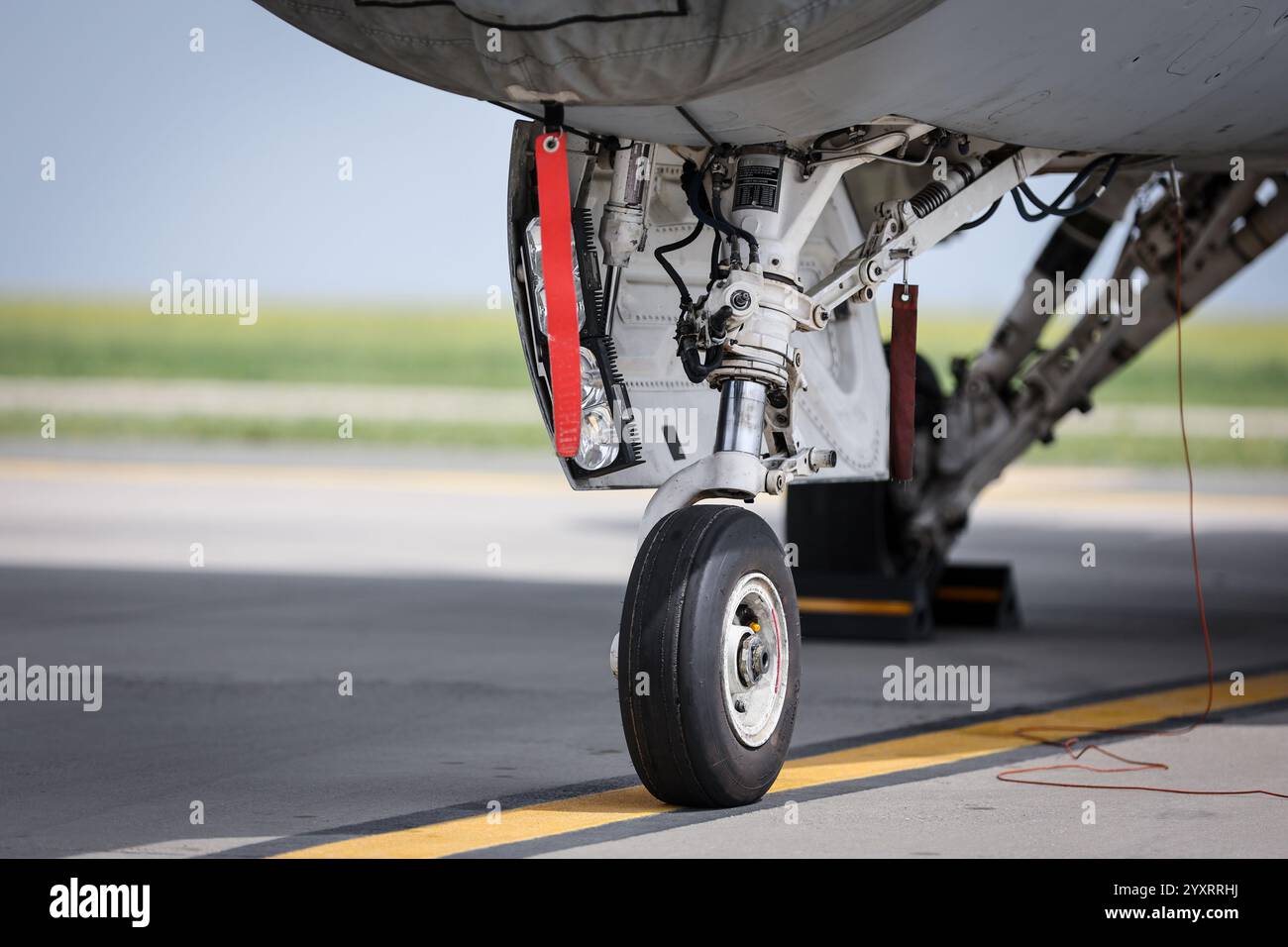 Fighter aircraft in parking position. Detail with landing gear Stock ...
