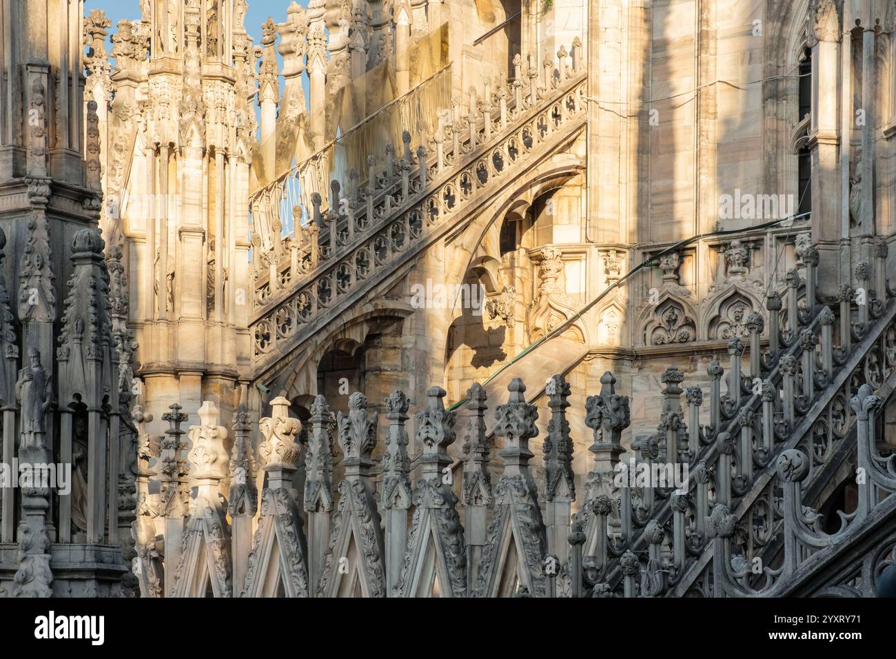 Gothic architecture of Milan Cathedral with spires, statues, pinnacles ...