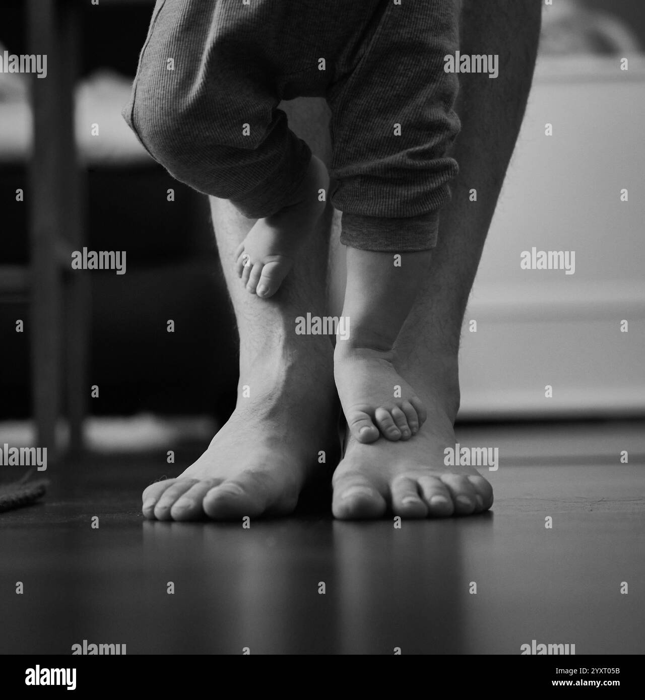 Big feet small feet contrast hi-res stock photography and images - Alamy