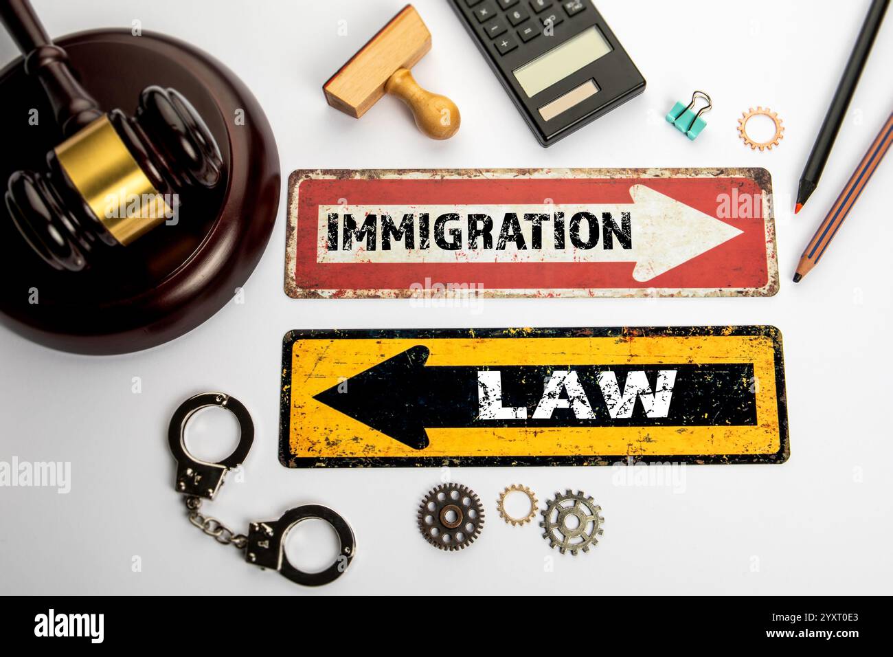 Immigration Law Concept. Two directional arrows on an office desk Stock ...