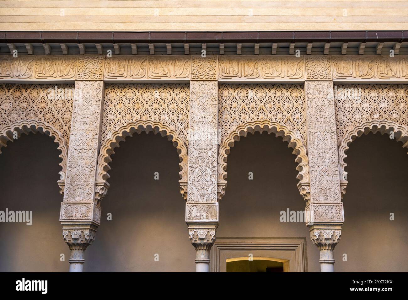 Elaborate arched columns in the Courtyard of the Lions in Rocchetta ...