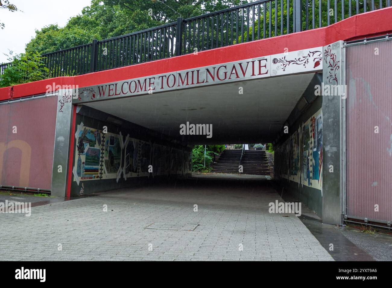 Decorated pedestrian underpass signposted 'Welcome to Milngavie' near ...