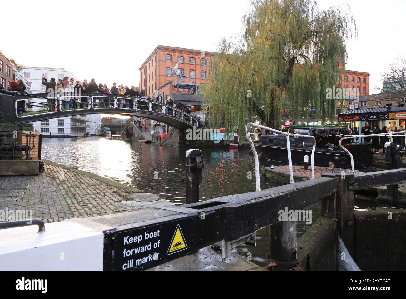 The bridge over Regents Canal at Camden Market, packed at Christmas ...