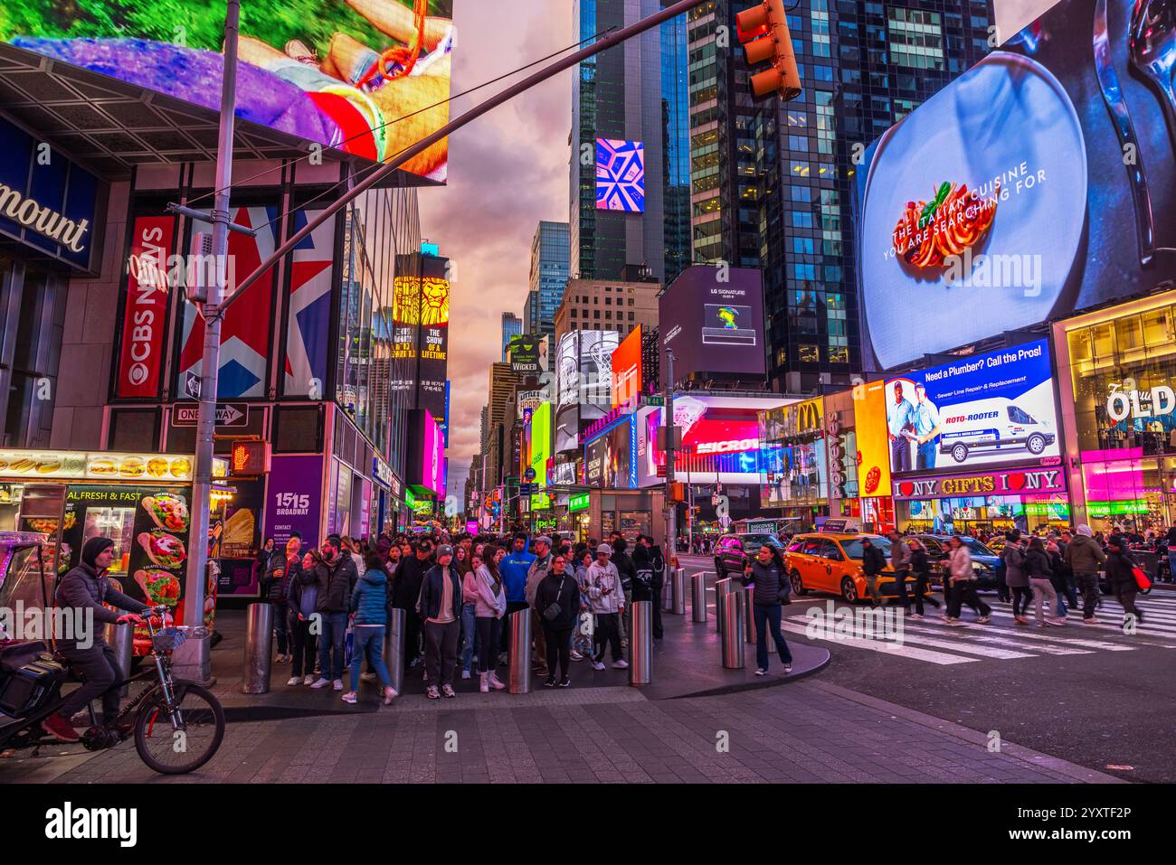Times Square evening scene with colorful billboards, crowded crosswalk ...
