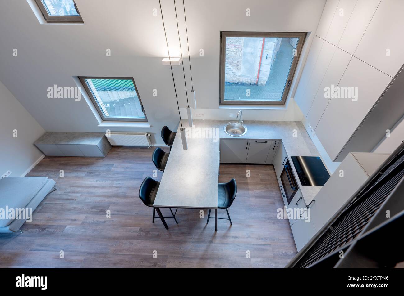 Bright and elegant modern kitchen featuring minimalist style ...