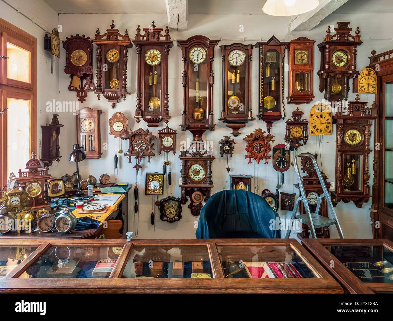Clockmaker's workshop and store in a replica of the interior of a ...