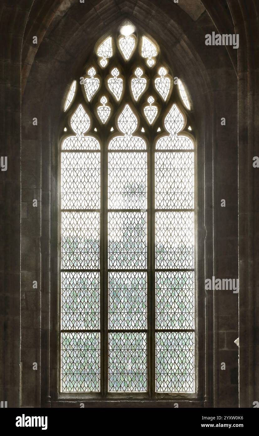 116 Multifoil arch topping a bar tracery window with stained-glass ...