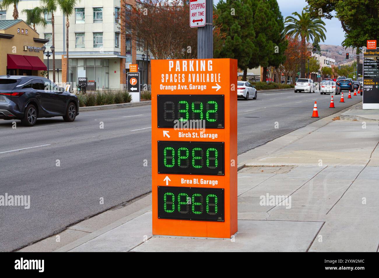 Brea, CA, USA - November 25, 2024: A orange Parking Garage Spaces Available electronic digital ...