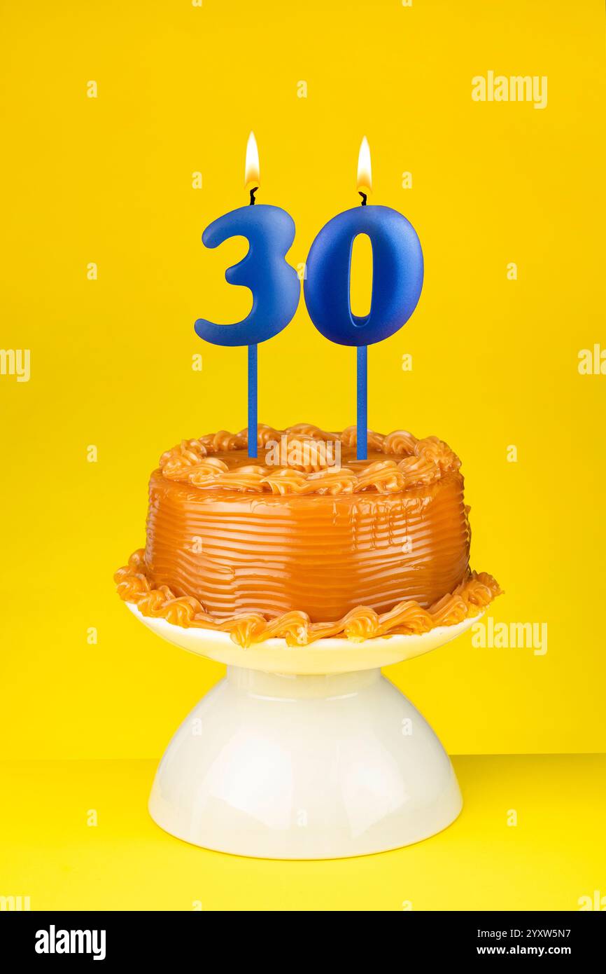 Number 30 Candle - Happy Birthday Cake on a yellow background Stock ...