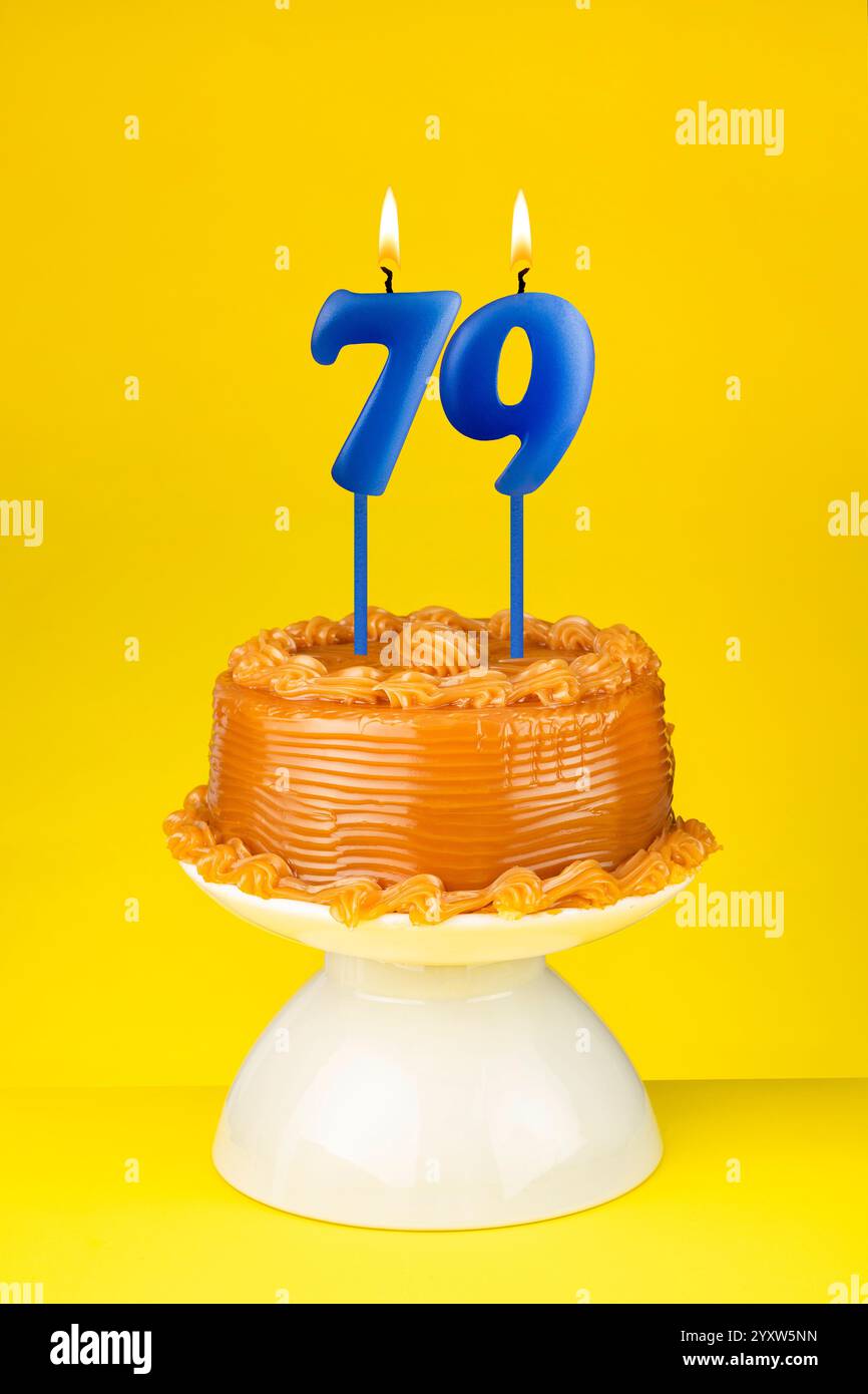 Happy birthday cake with number 79 candle - Card on a yellow background ...