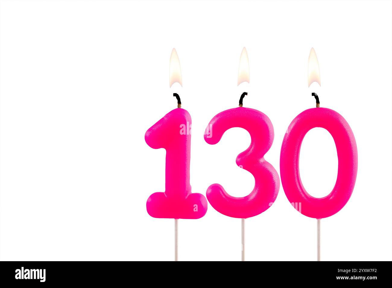 Pink number 130 birthday candle lit on white background Stock Photo - Alamy