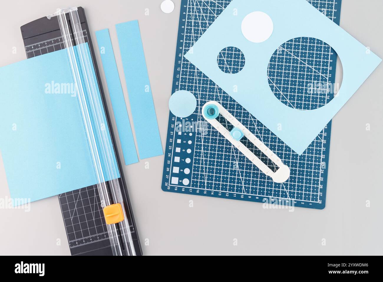 Collection of crafting tools and materials for cutting circles ...