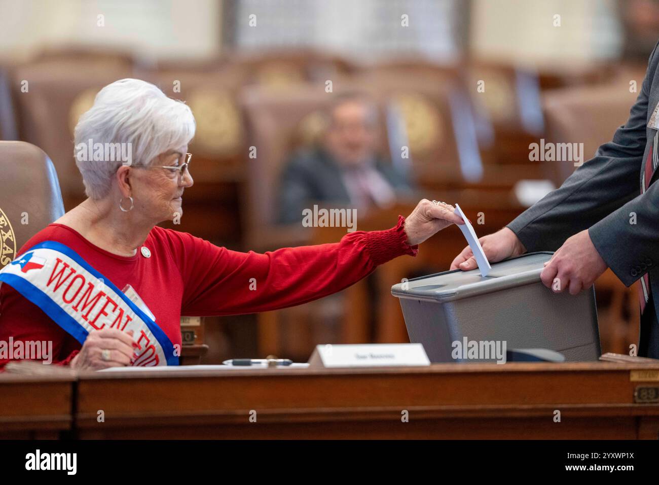 Elector SUE REEVES ,l, casts her vote for Donald Trump (not shown) as ...