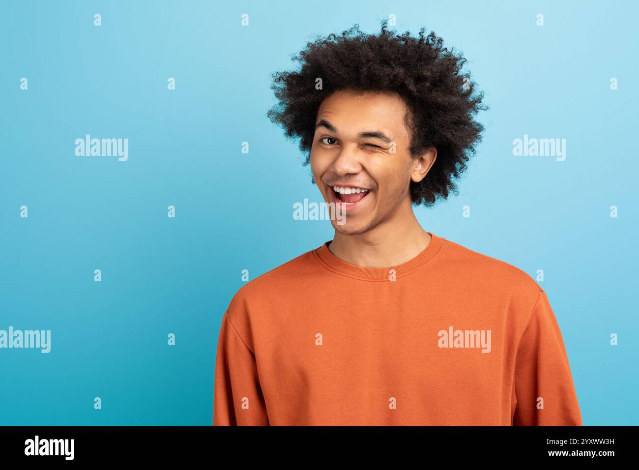 Cheerful african guy winking smiling hi-res stock photography and ...