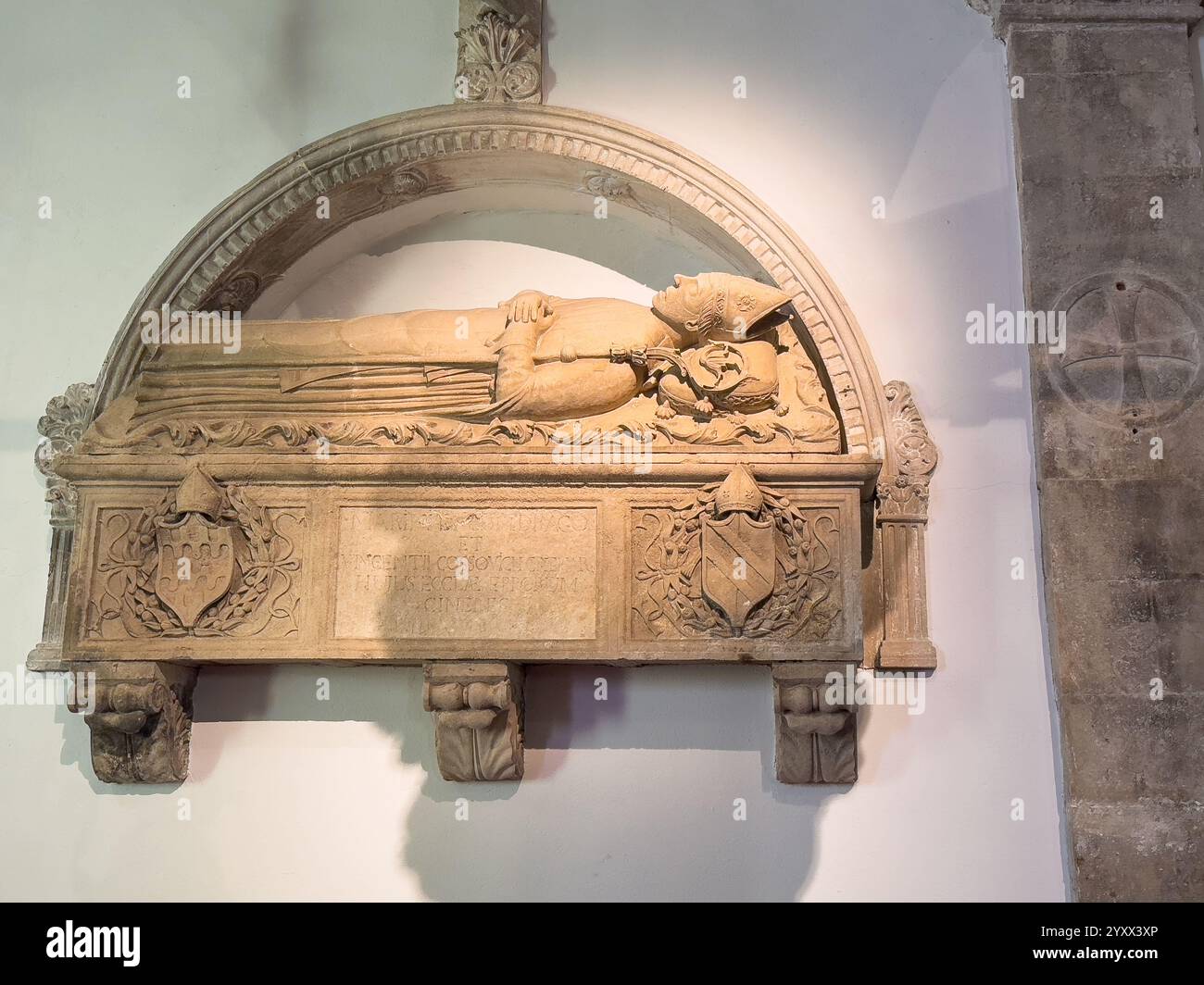 Korcula, Croatia - June 30, 2024: Saint Mark Cathedral. Epitaph stone sculpture of bishop laying ...